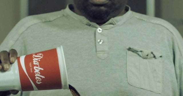 Health group remakes iconic Coca-Cola jingle to take on soda - CBS News