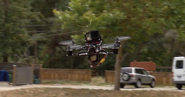 Pilots race drones in first national championships - CBS News