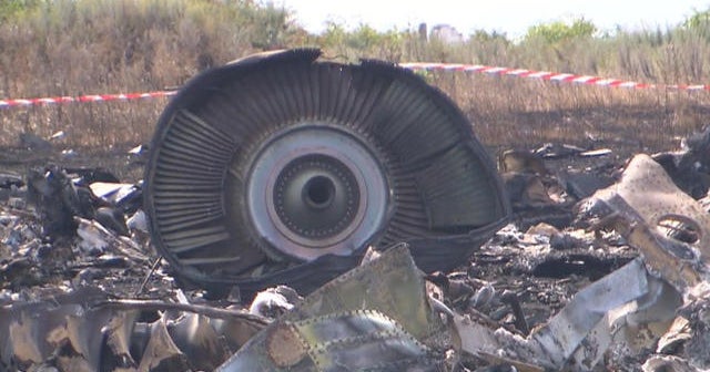 Report: MH17 shot down by Russian-made missile - CBS News