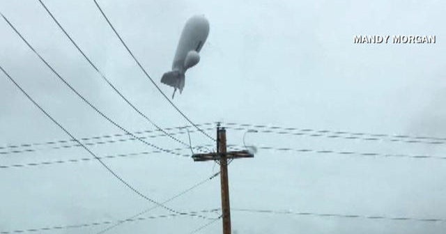 Loose military blimp back on ground - CBS News
