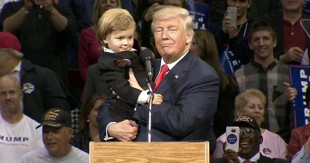 Trump picks up a pint-sized supporter at rally - CBS News