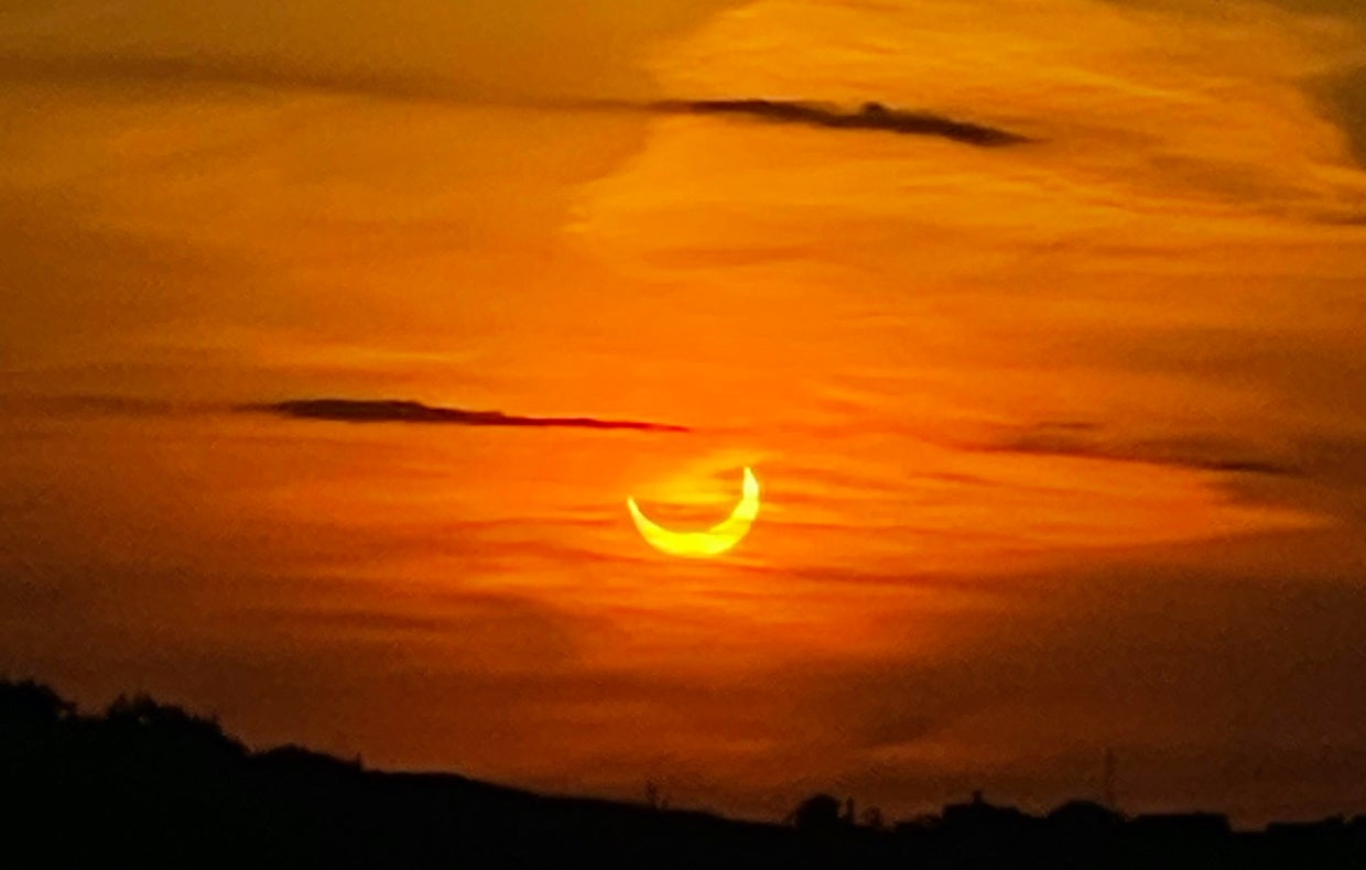 Rare "ring of fire" solar eclipse captured in spectacular photos from ...