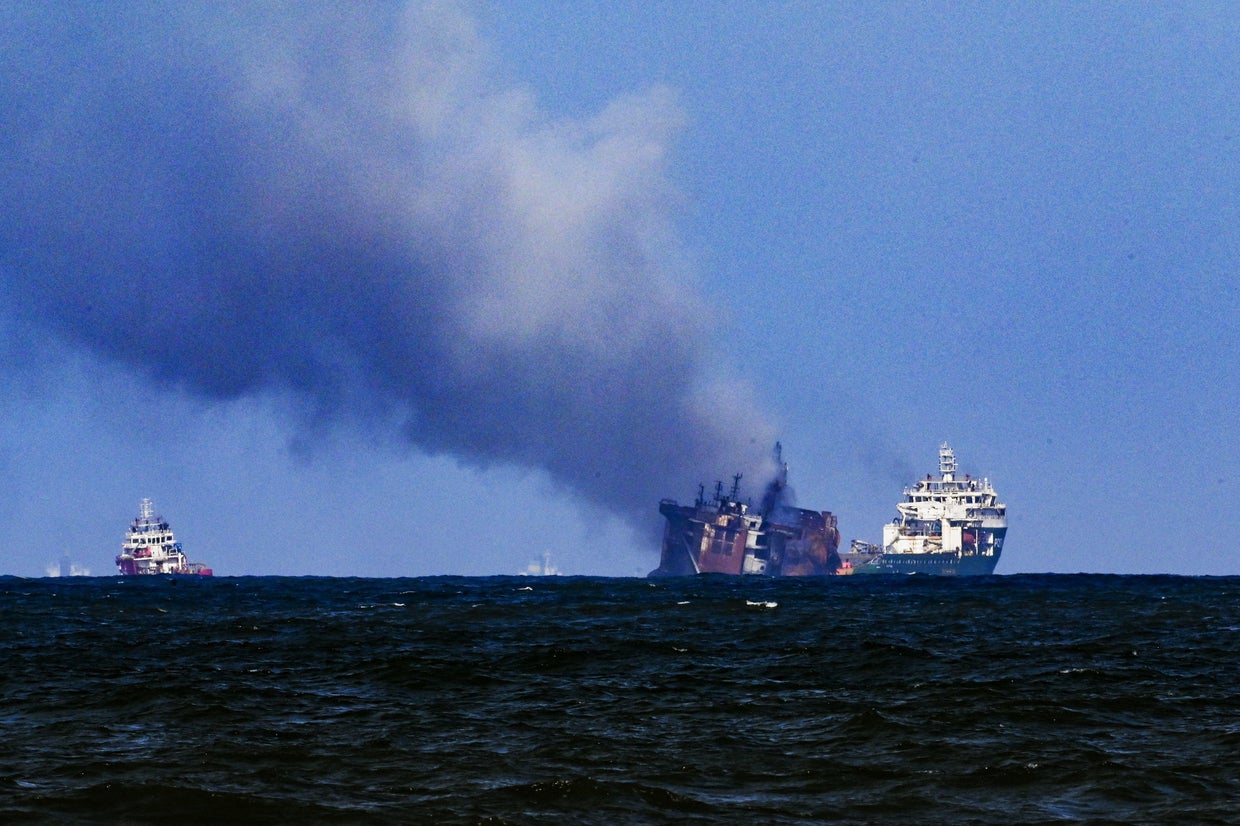 Burned, submerged cargo ship spills tons of plastic granules into sea ...
