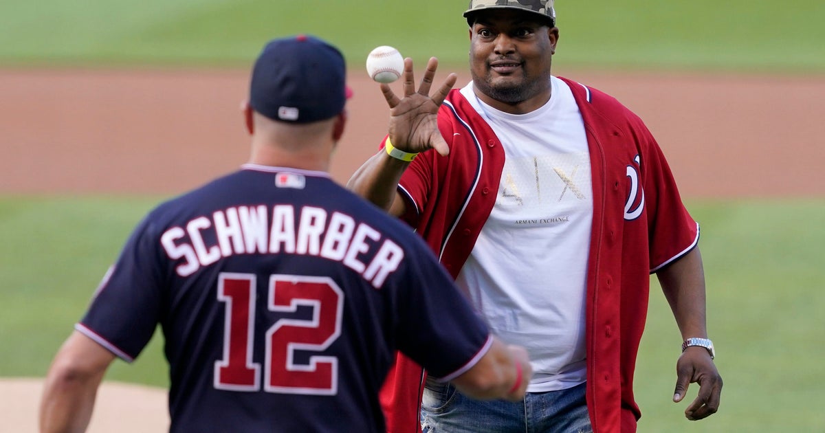 Capitol police officer Eugene Goodman throws first pitch at Nationals ...