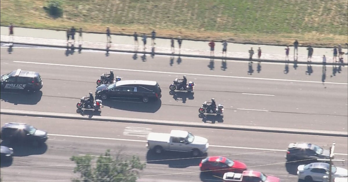 Crowds Line Streets With American Flags For Fallen Arvada Police ...
