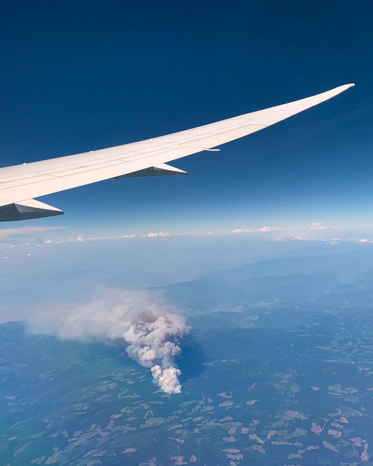 Wildfire amid record heat wave forces entire village in Canada to ...