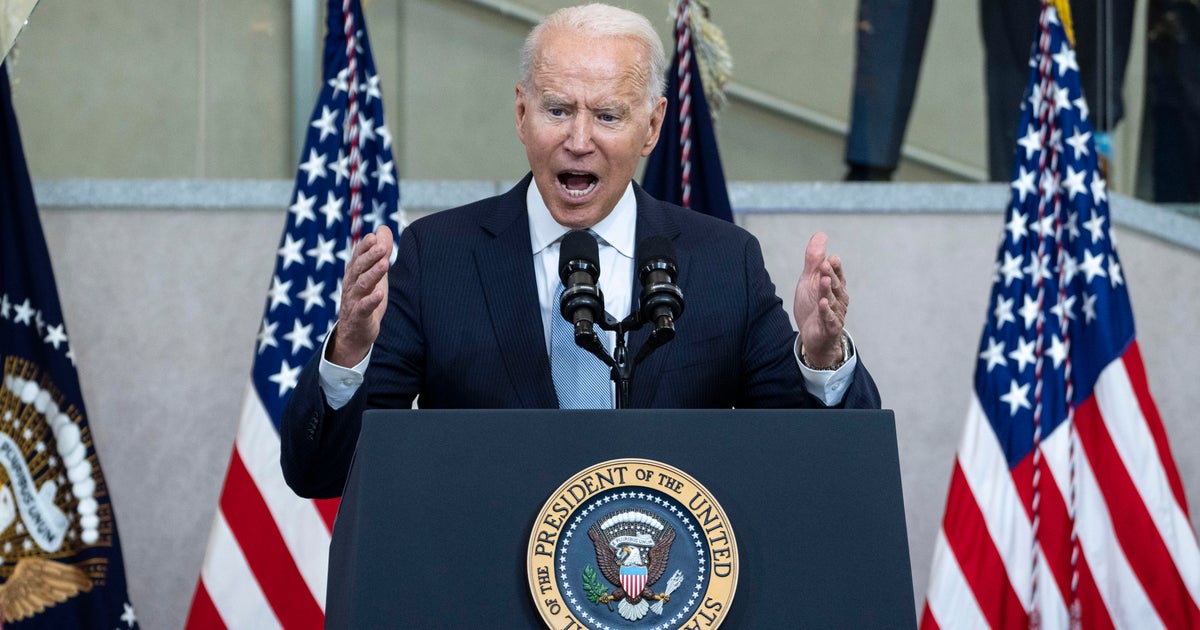 Biden denounces "21st century Jim Crow assault" on voting access - CBS News