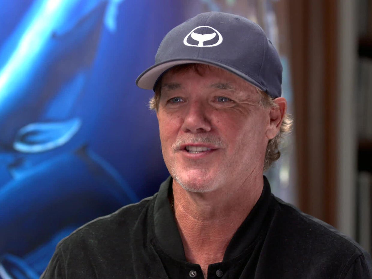 The artist Wyland and his "whaling walls" - CBS News