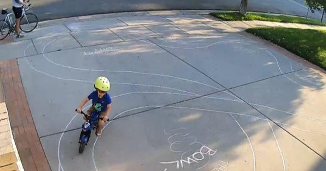 Man draws chalk racetrack for neighborhood kid, more follow - CBS News