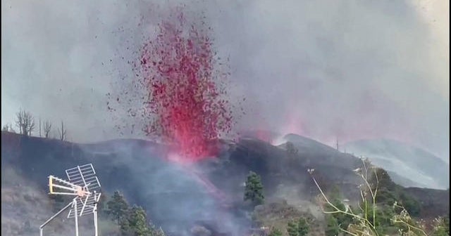 Watch: Volcano erupts on Spain's La Palma island - CBS News