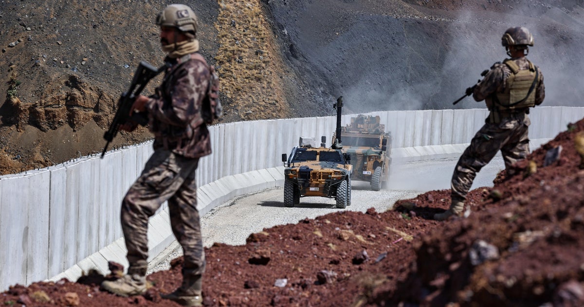 Turkey builds a wall to keep out Afghan refugees - CBS News