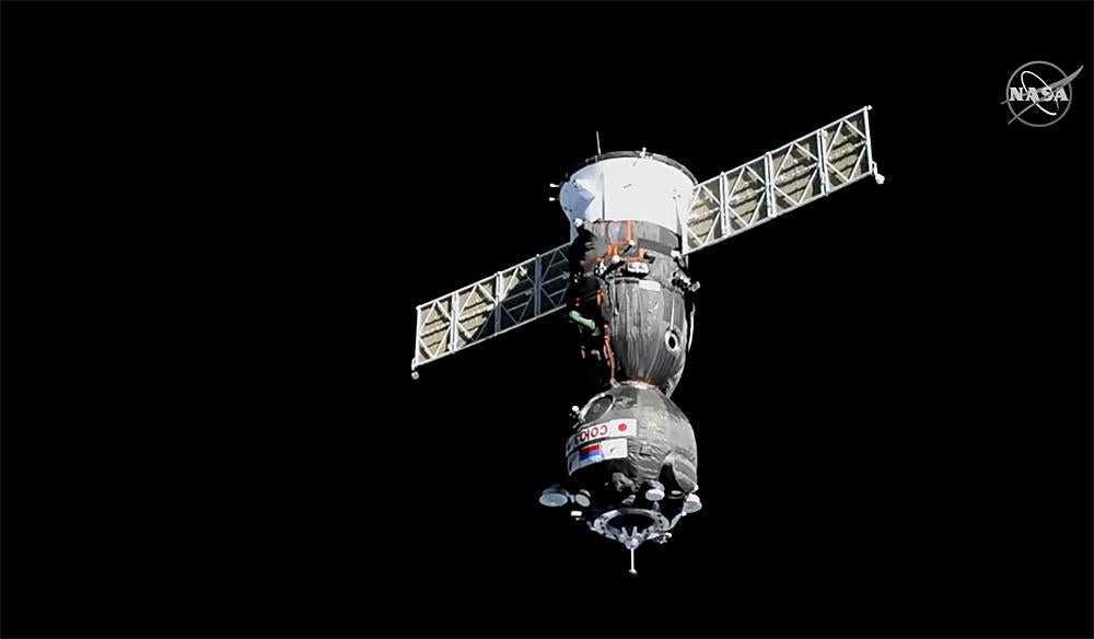 Russian rocket launches carrying Japanese billionaire and his assistant ...