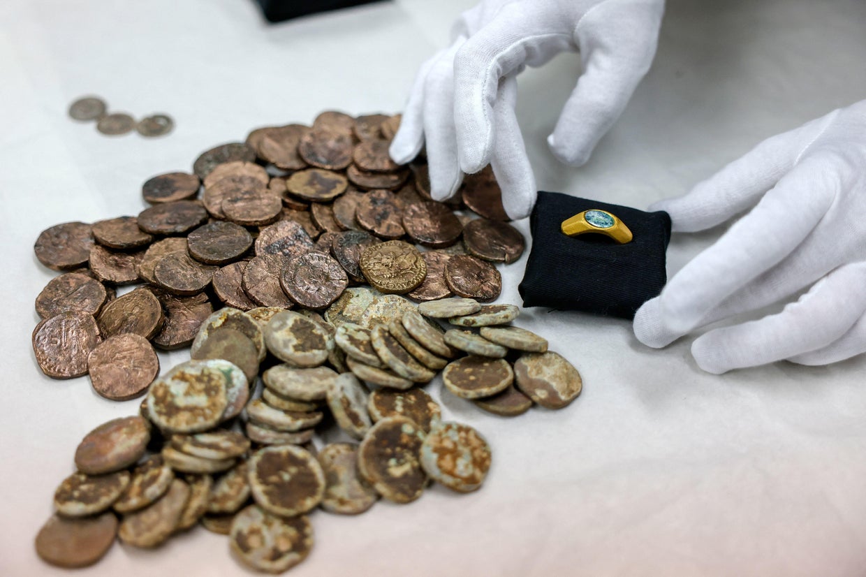 Gold ring with Jesus symbol among treasure trove found in ancient ...