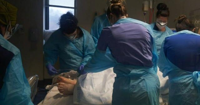 Surging COVID-19 hospitalizations strain U.S. health care system - CBS News