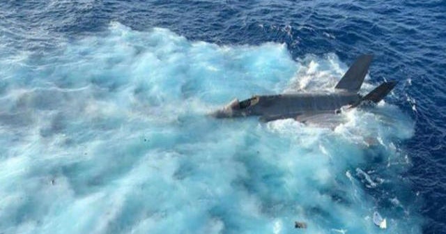 Images emerge of Navy jet crashing into South China Sea - CBS News