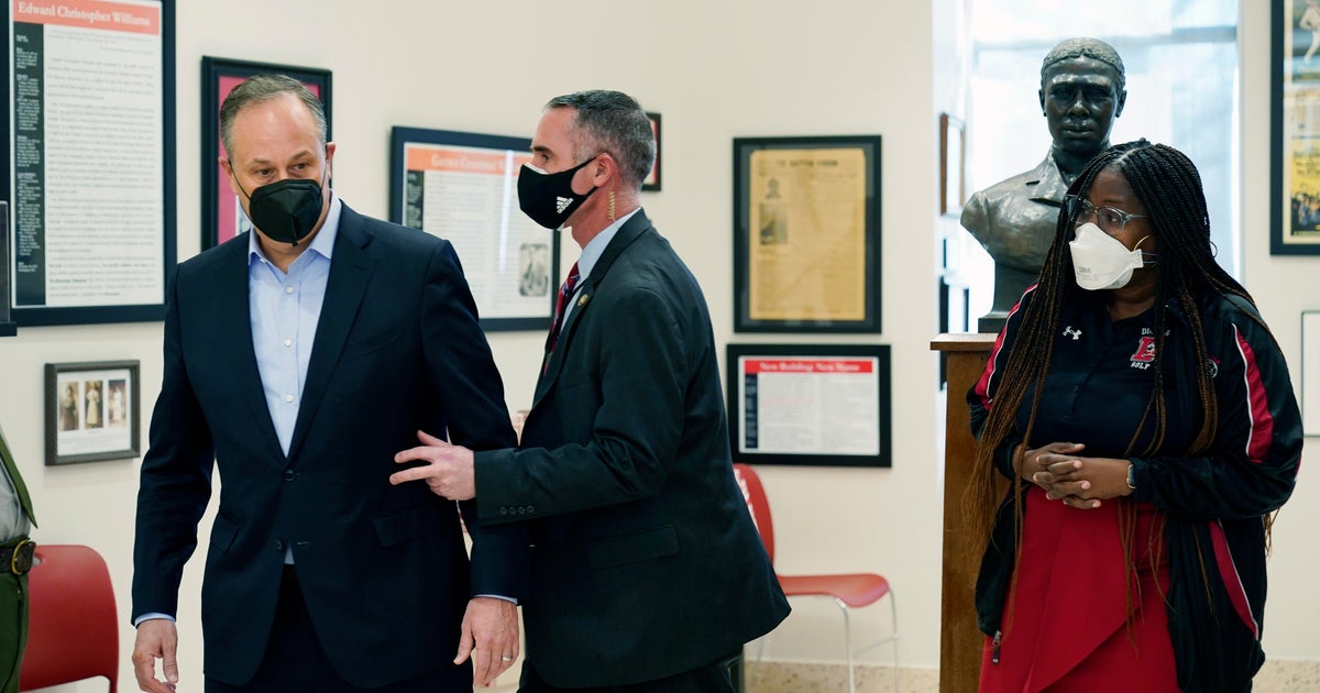 Doug Emhoff rushed out of D.C. high school event over bomb threat - CBS ...