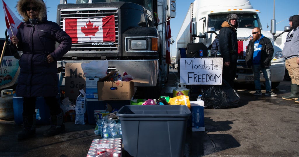 Truckers Form Blockade At Canadian Border In Protest Of COVID-19 ...