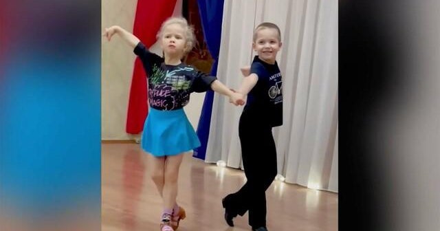 Ballroom dancers show off skills - CBS News