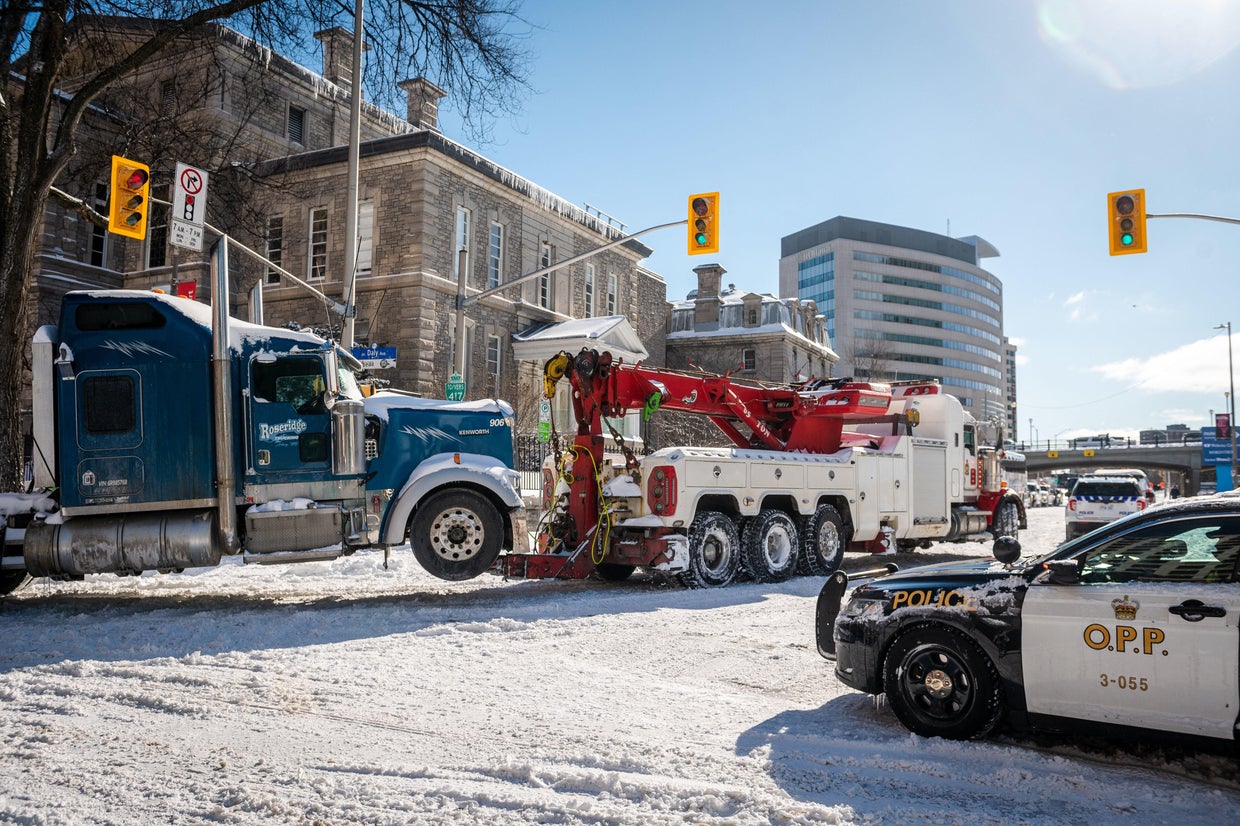 At least 100 arrested in police crackdown on Ottawa protest - CBS News