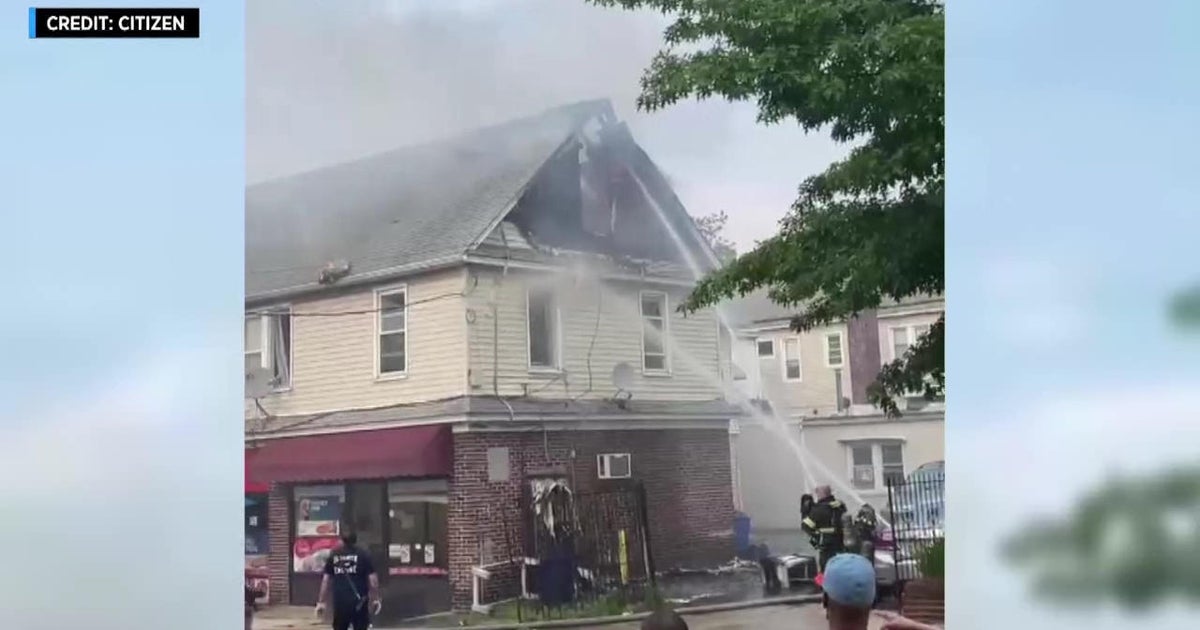 Firefighters battle 4-alarm multi-home blaze in Elizabeth, N.J. - CBS ...