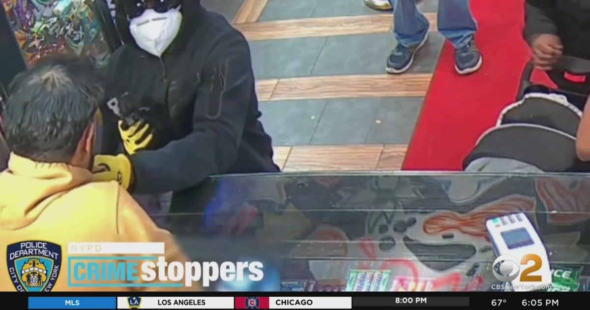 Caught on camera: Robbery suspects hold employees at gunpoint inside ...