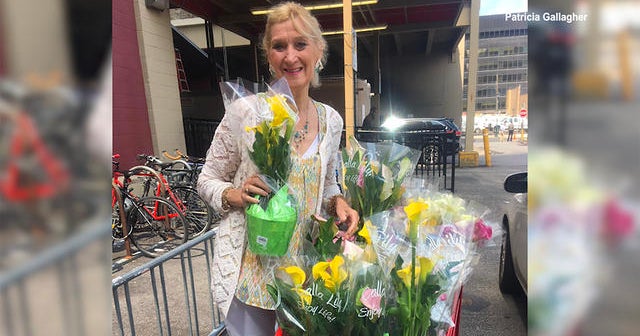 "Happy flower lady" spreads joy with leftover blooms - CBS News