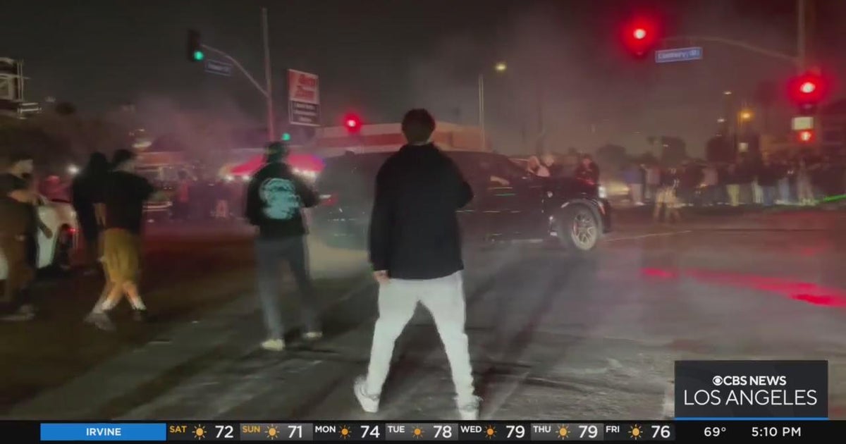 Street takeover on Century Boulevard in South LA - CBS Los Angeles