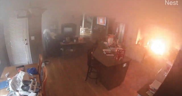 Video shows dog turning on stovetop, sparking fire - CBS News