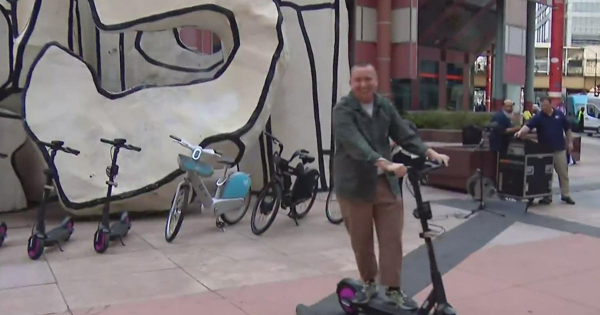 Spin electric scooters now available in Chicago - CBS Chicago