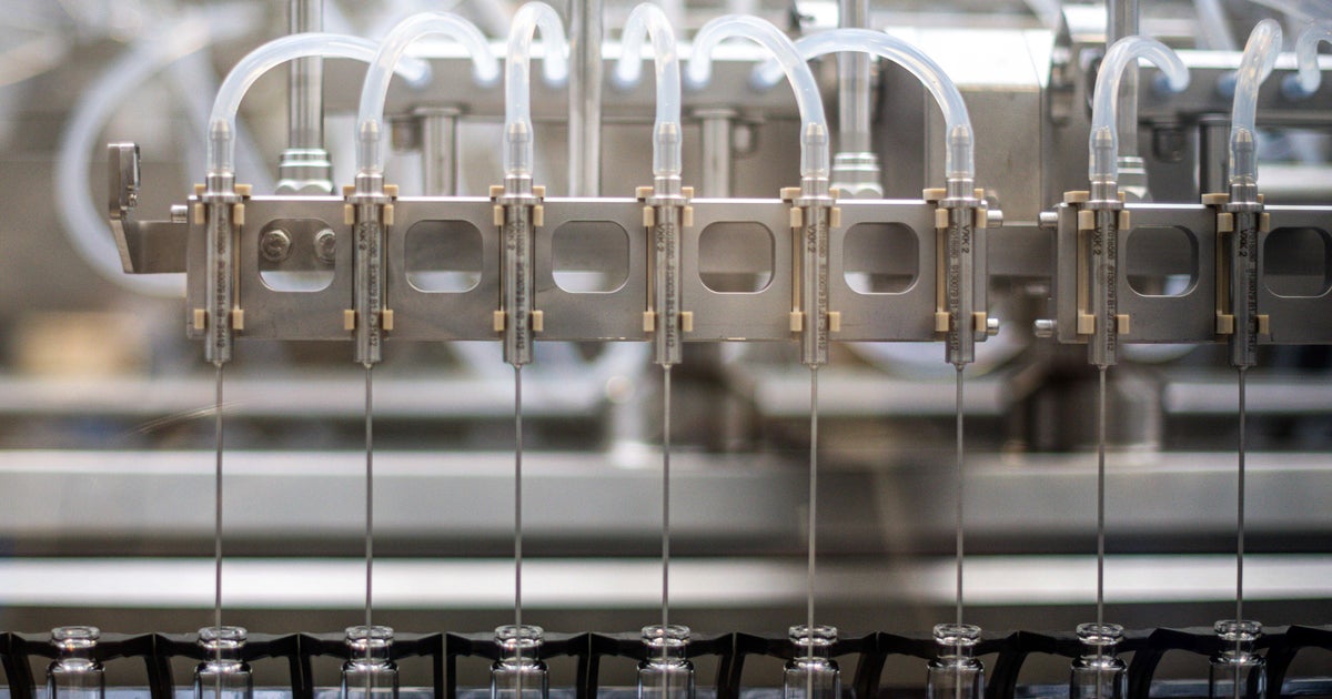 Pfizer says tweaked COVID shots boost omicron protection - CBS News