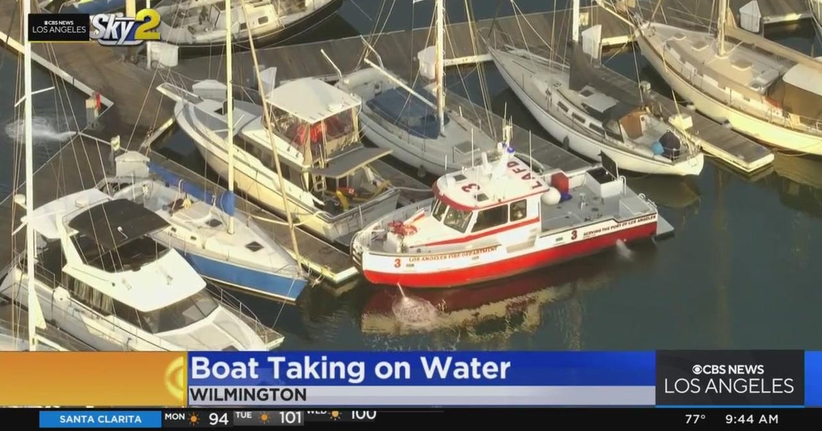LAFD crews work to rescue boat taking on water at Wilmington Docks ...