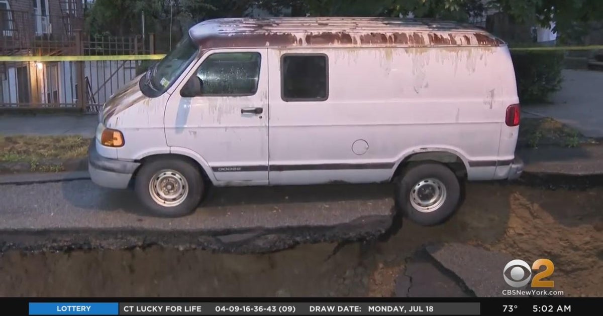 Storm cleanup underway after massive sinkhole opens in Morris Park ...