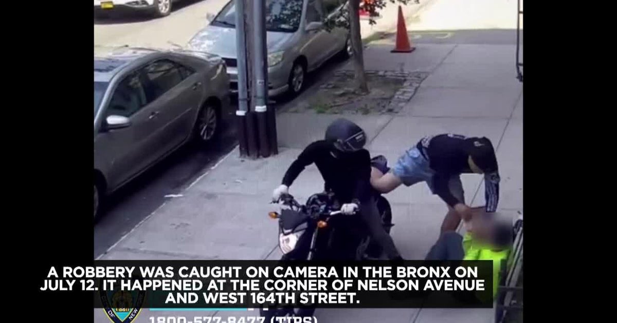 Caught on camera: Man robbed by motorcycle passenger in the Bronx - CBS ...