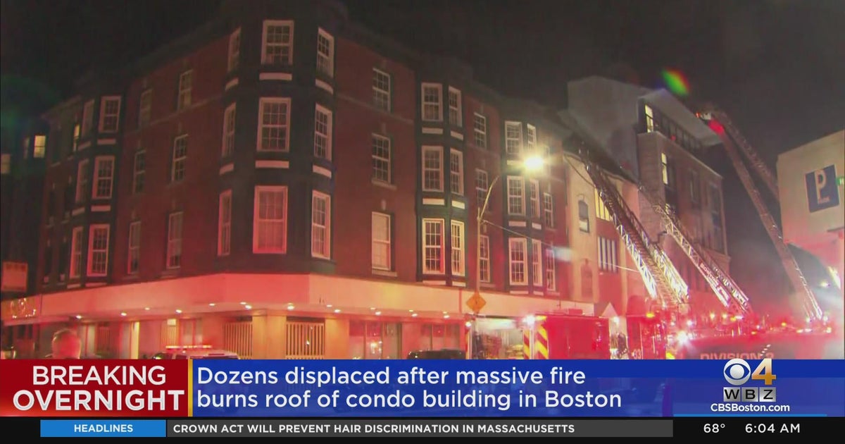 At least 50 people forced out of homes in rooftop condo fire in Boston ...