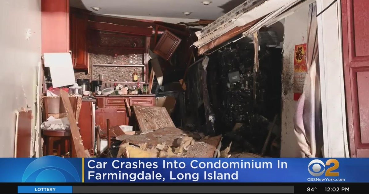 Car crashes into Long Island condominium - CBS New York