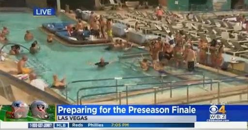 Dan Roche jumps in the pool at Circa Resort in Las Vegas - CBS Boston