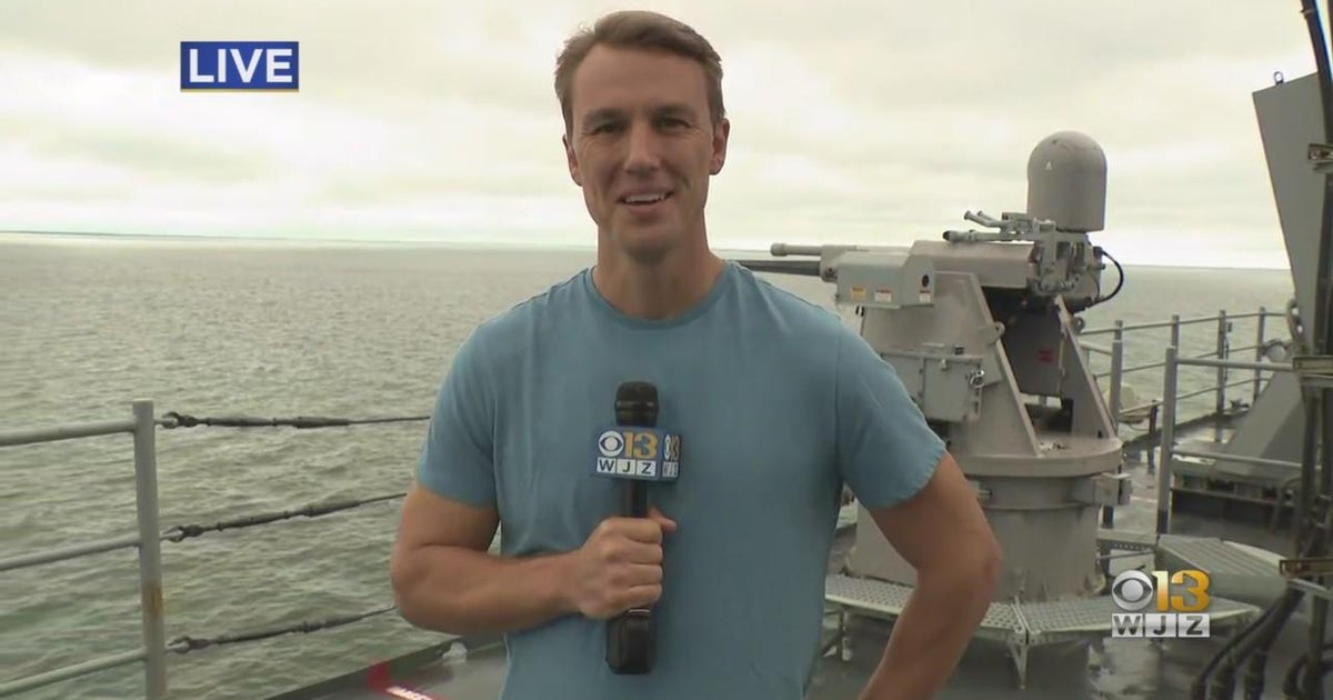 Sean's on a military ship sailing into the Inner Harbor for Fleet Week ...