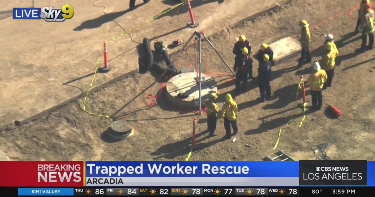 Trapped worker rescued from 20-foot hole at Santa Anita Racetrack - CBS ...