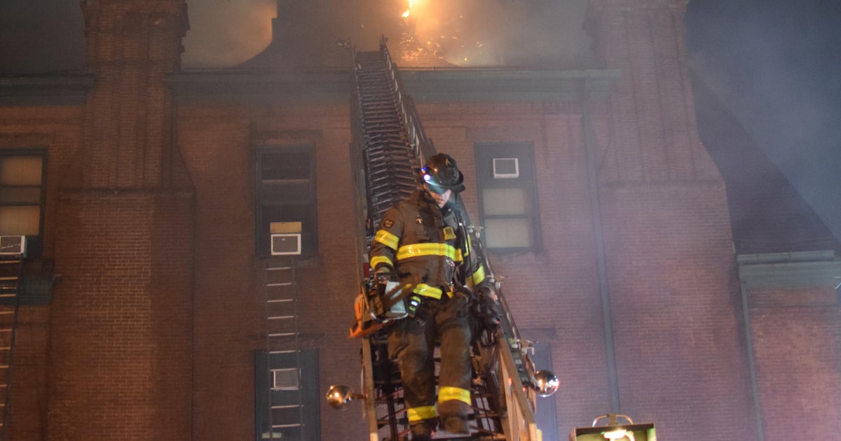 Investigation underway after 4-story building catches fire in Old ...