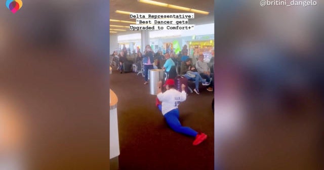 Passenger who performs "best dance" gets seat upgrade - CBS News