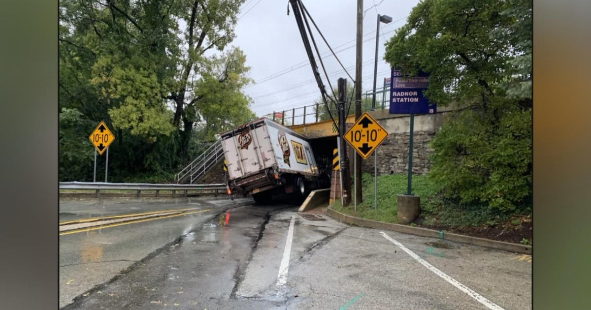 Trailer truck stuck under bridge causing road closure in Delaware ...