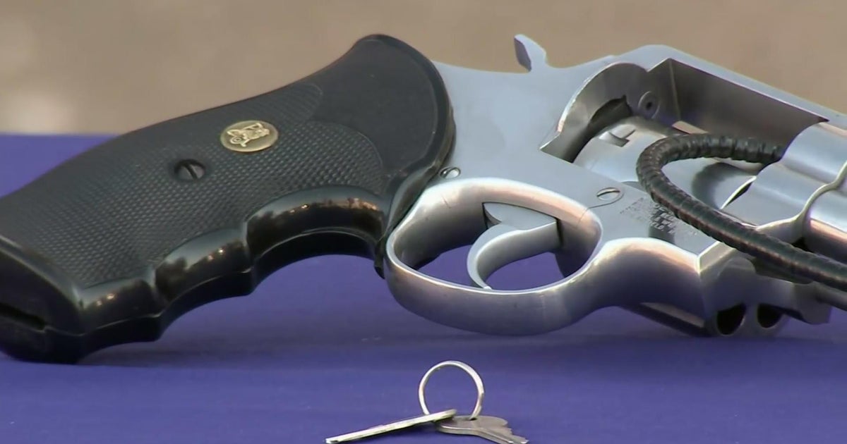 Cook County Sheriff distributes free gun locks for families - CBS Chicago