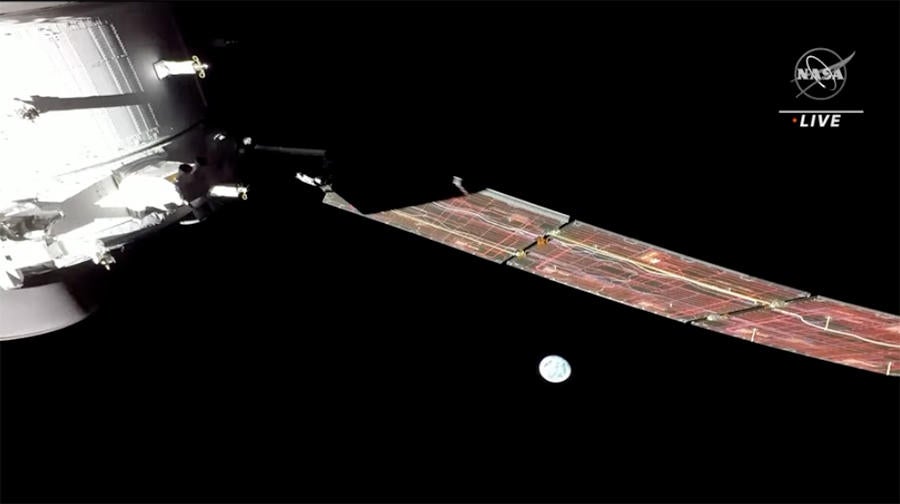 NASA's Orion capsule races past the moon in a course-changing flyby ...