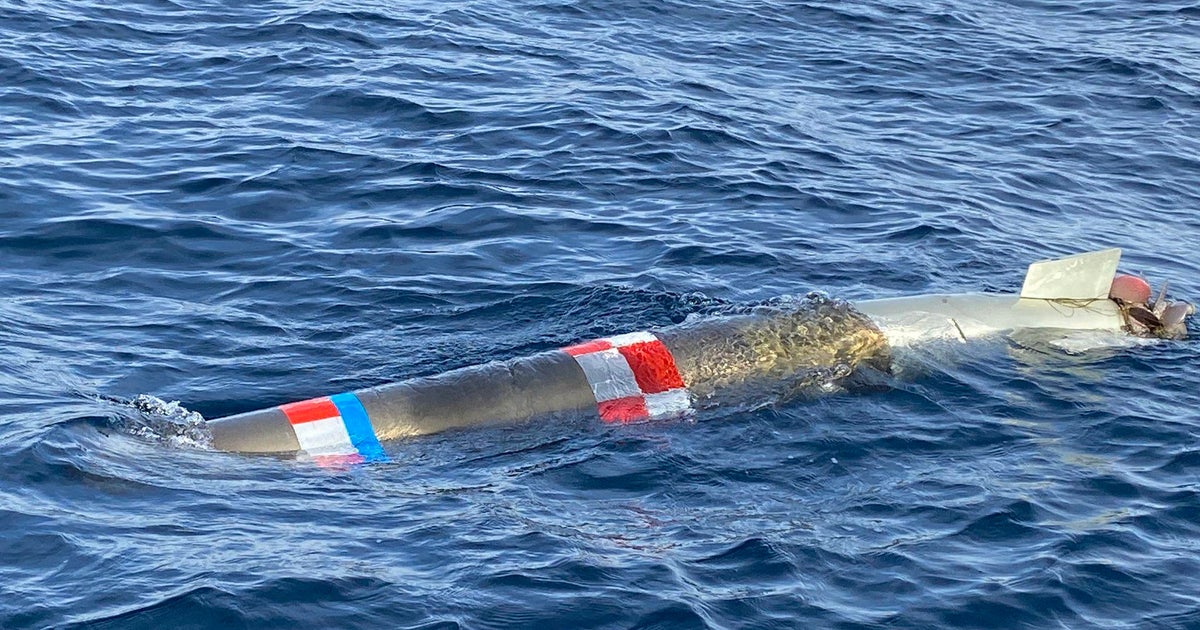 Authorities recover "inert military training device" floating in water ...