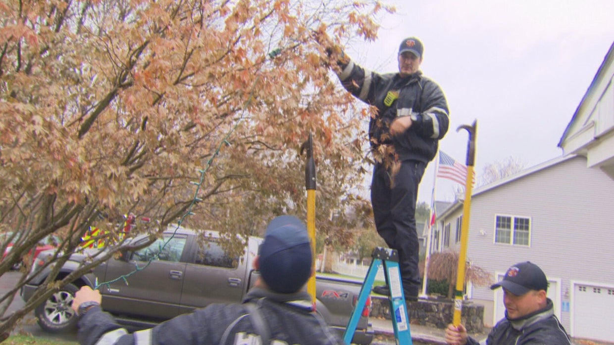 Firefighters bring gift of joy and light to Hudson woman - CBS Boston