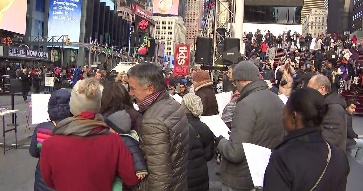 Times Square filled with song and prayer for Ukraine - CBS New York