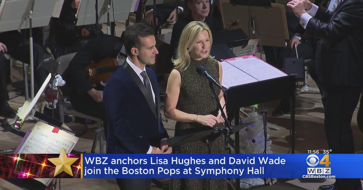 WBZ-TV's Lisa Hughes and David Wade read "Twas the Night Before ...