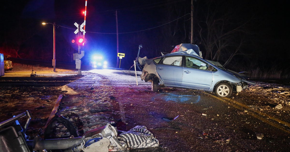 Driver injured after car struck by train in Woodstock - CBS Chicago
