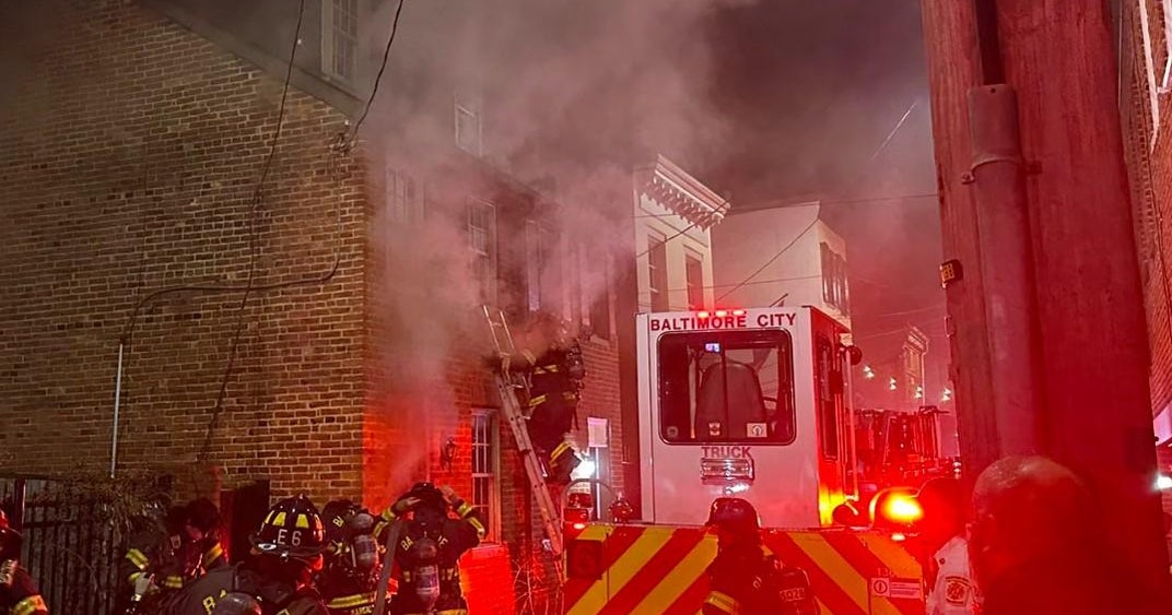 Firefighters battle fire at two-story rowhome in Federal Hill neighborhood - CBS Baltimore