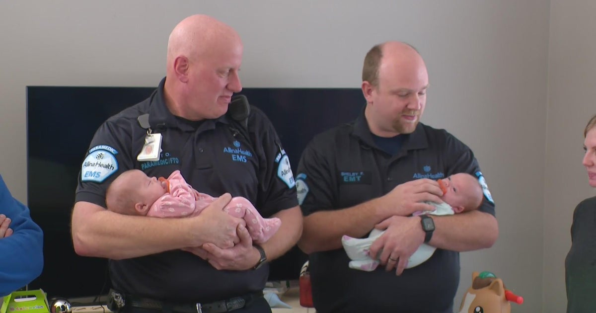 EMS workers meet the baby twins they delivered in back of ambulance ...